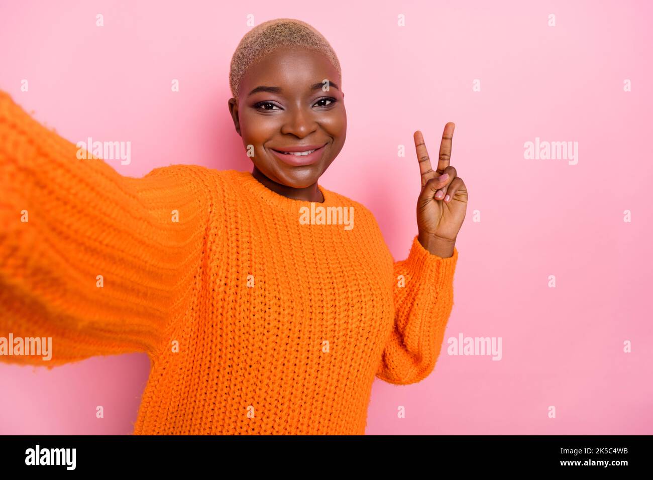 Photo of friendly person take selfie hand fingers demonstrate v-sign ...
