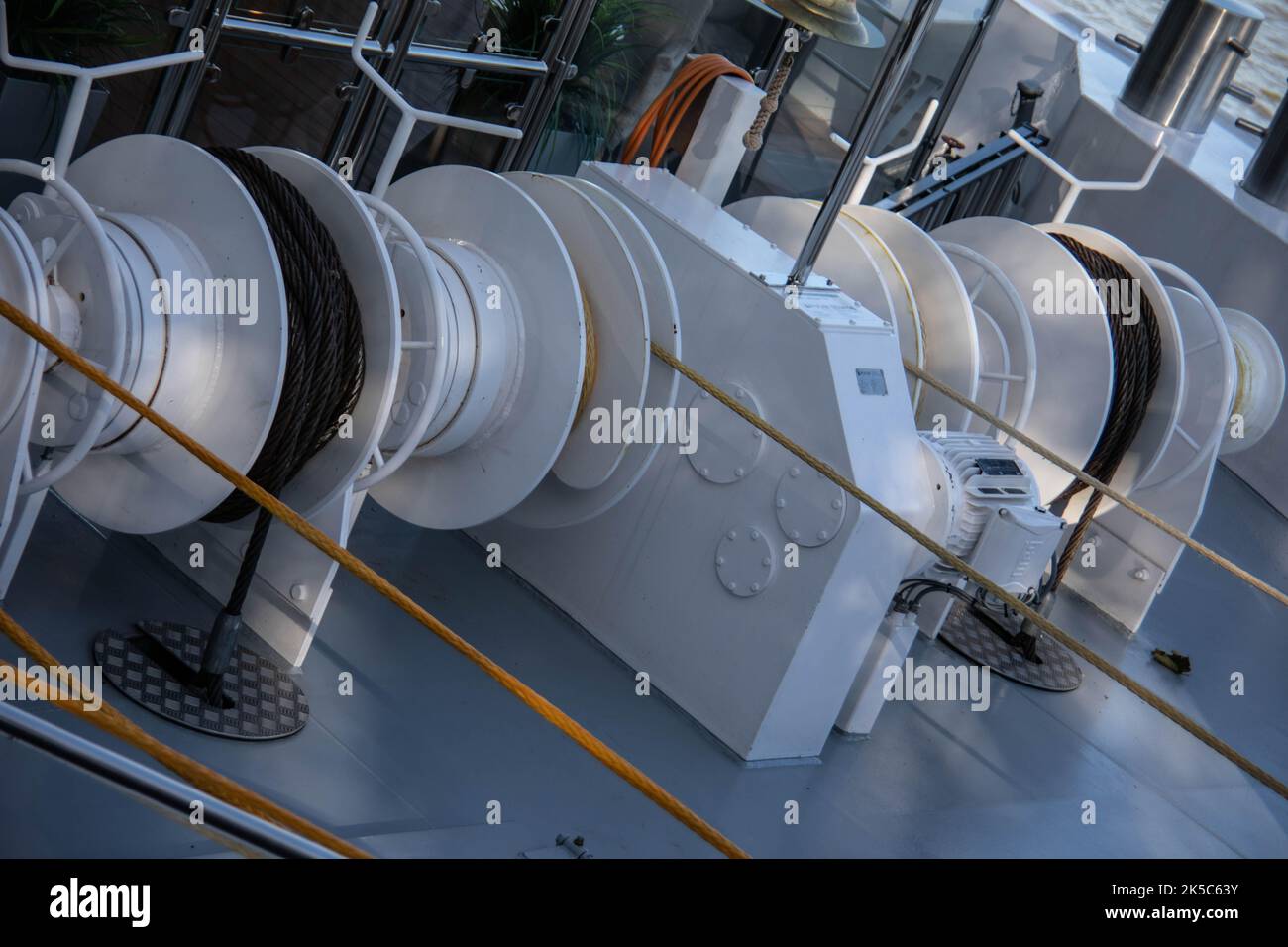 Ship is anchored to the quay with ropes Stock Photo - Alamy