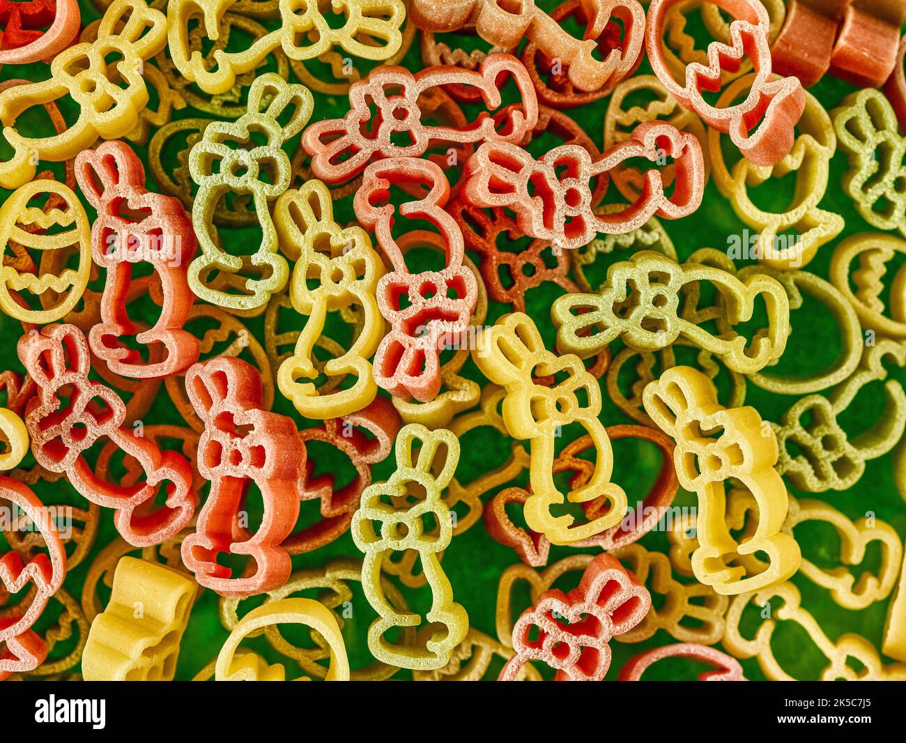 Food ingredient still-life of Tricolour, Easter Pasta Shapes in close ...