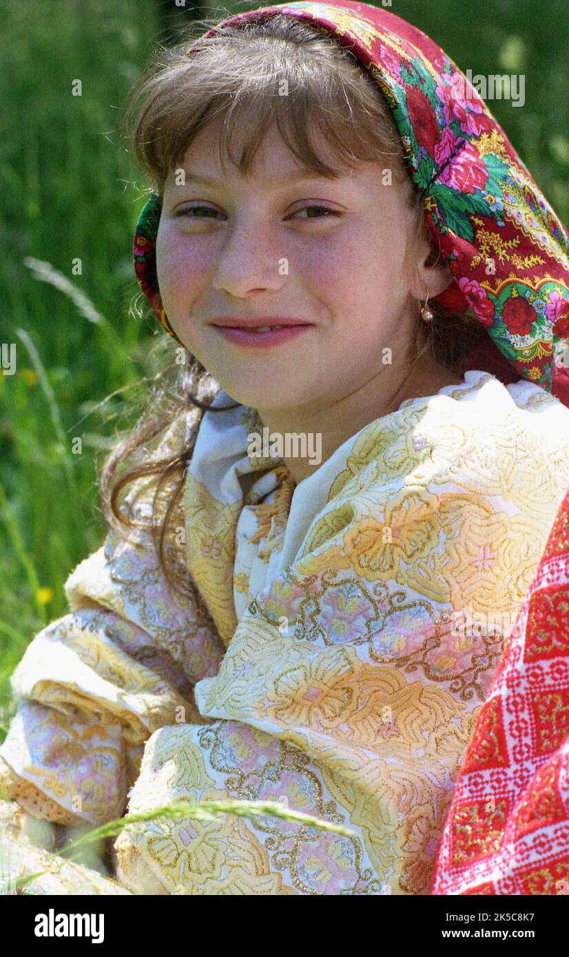 Maieru, Bistrița-Năsăud County, Romania, 2000. Young girl in beautiful ...