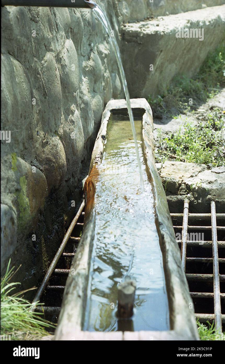 Wooden trough spring water hi-res stock photography and images - Alamy
