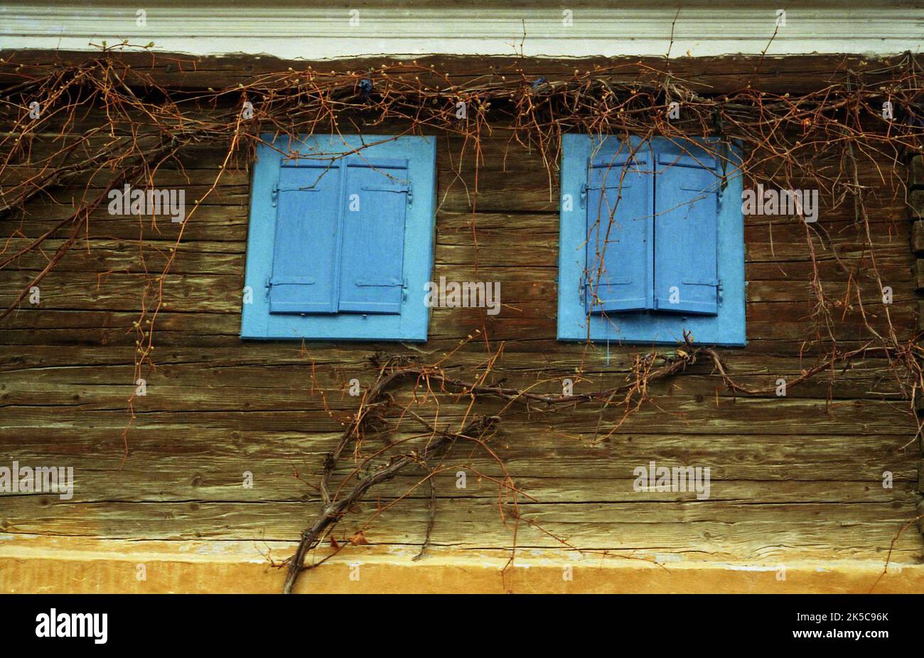 Sibiu County, Romania, 2000. Beautiful facade of a traditional wooden ...