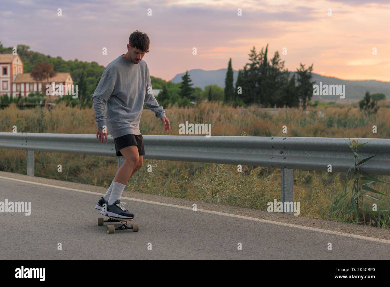 Man riding a skateboard hi-res stock photography and images - Alamy