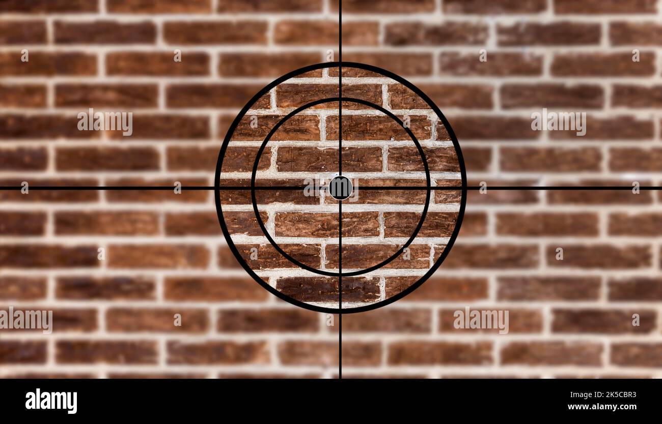 Crosshairs in front of a stone wall Stock Photo - Alamy