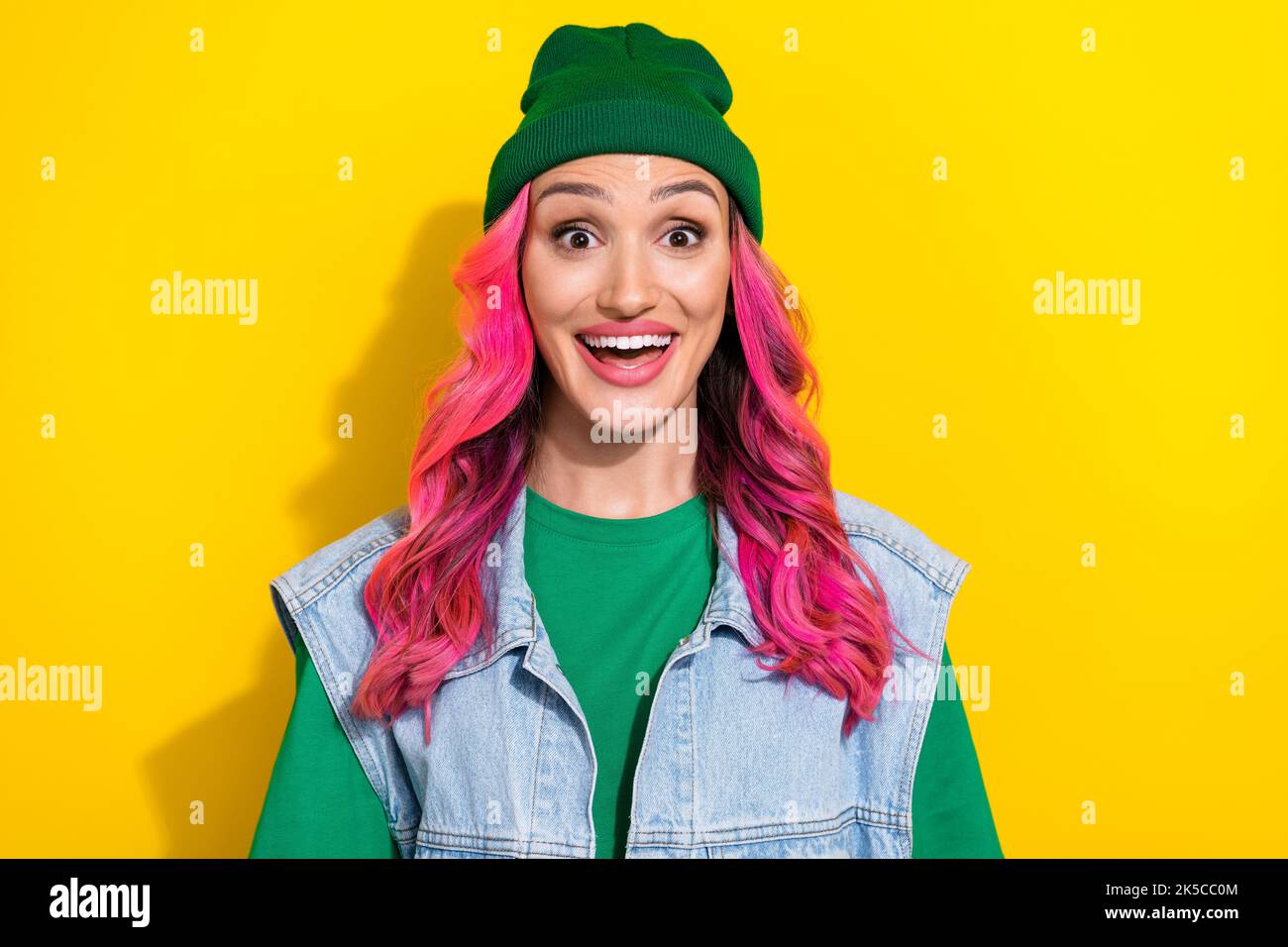 Photo of adorable bright eccentric girl with pink hairdo dressed jeans ...
