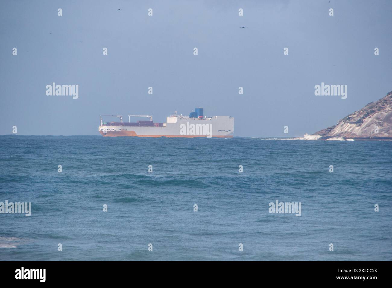Cargo ship seen from Copacabana beach in Rio de Janeiro Stock Photo - Alamy