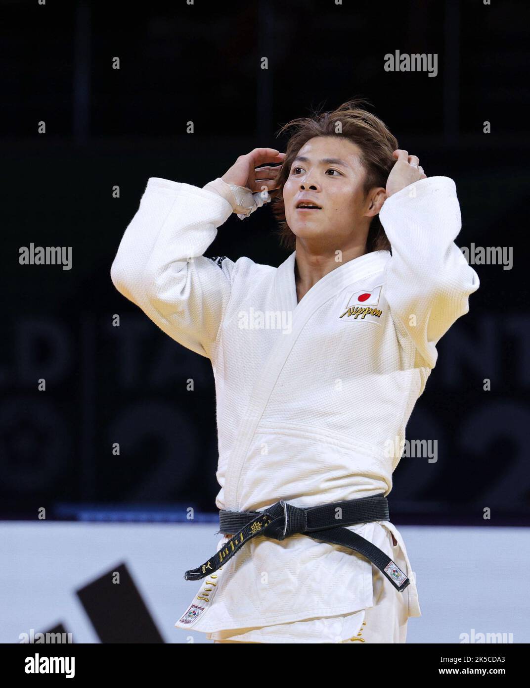 Japan's Hifumi Abe reacts after beating compatriot Joshiro Maruyama in ...
