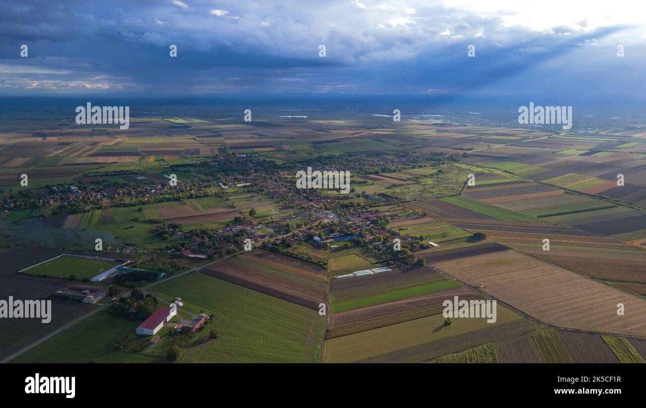 panoramic aerial view of the village in the plain with dramatic colors ...