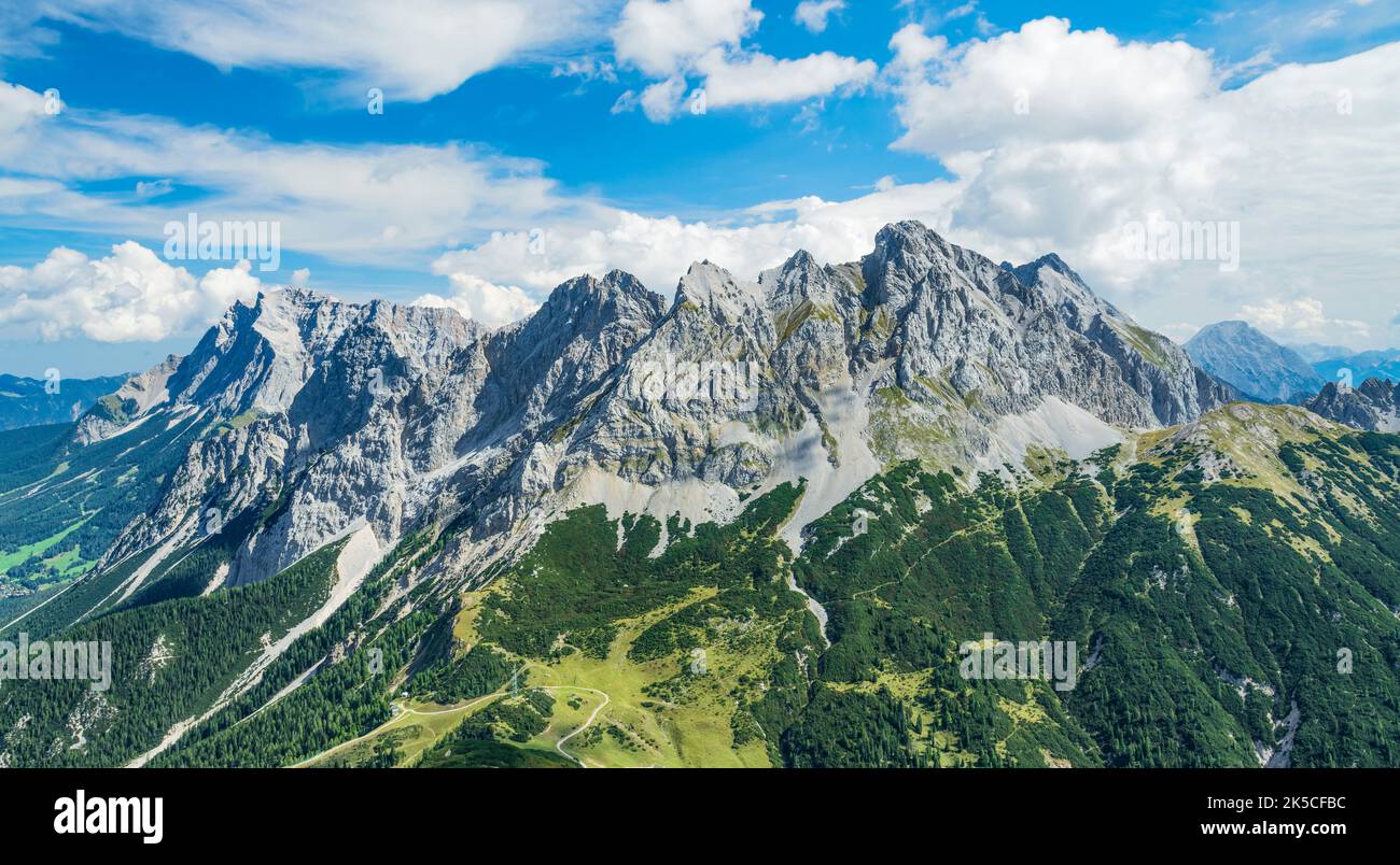 Alpine landscape with rocky mountains on sunny summer day. Zugspitze ...