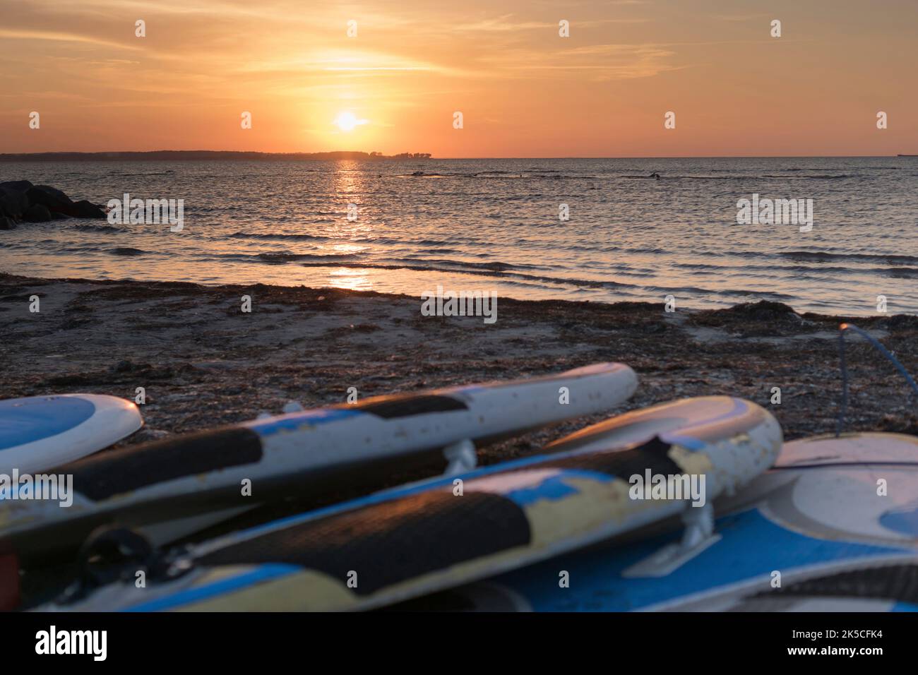 Sunlight, sun, beach, sea, surfboards Stock Photo - Alamy