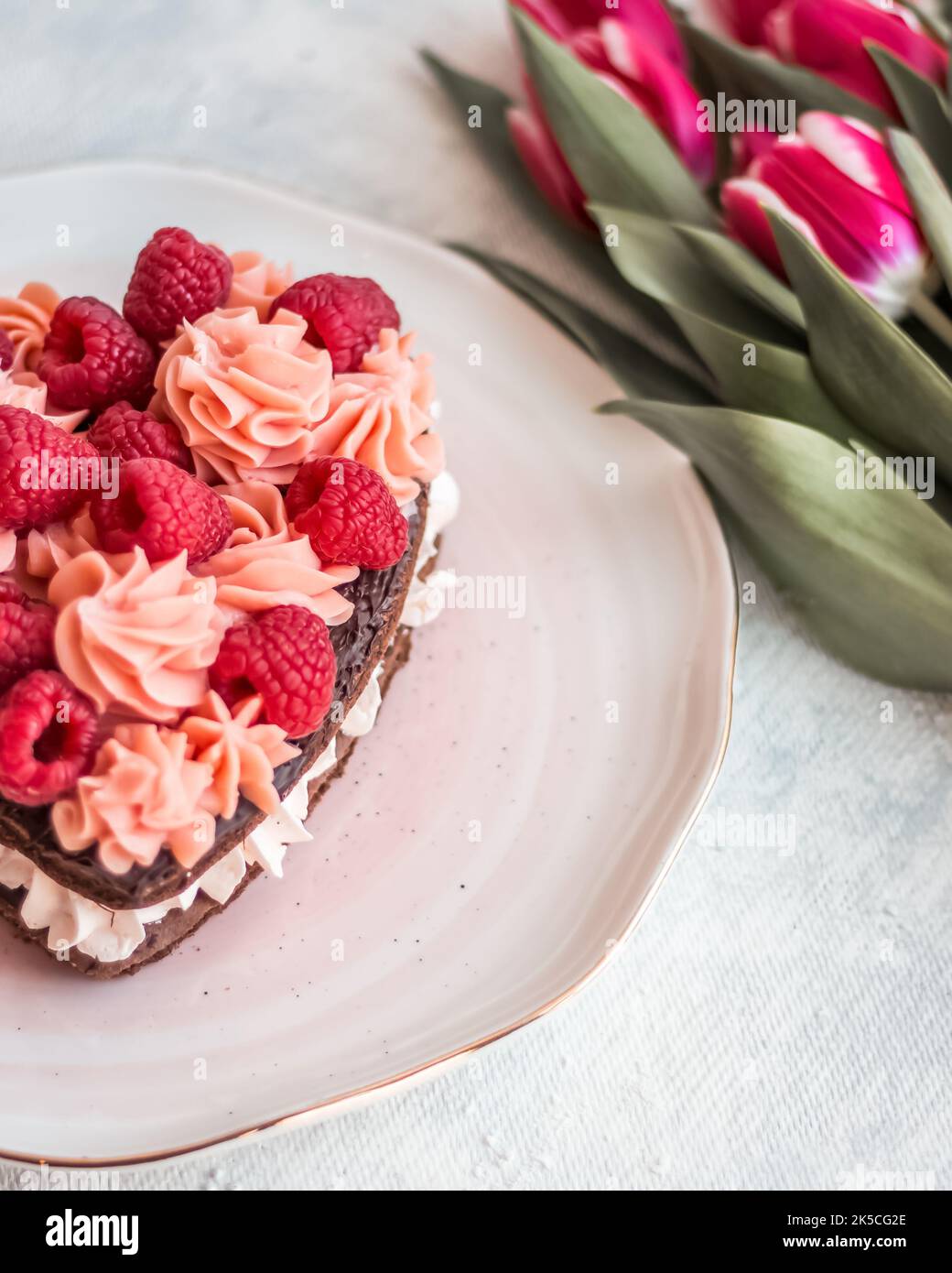 Cake in the shape of a heart from Traditional French dessert eclair and ...