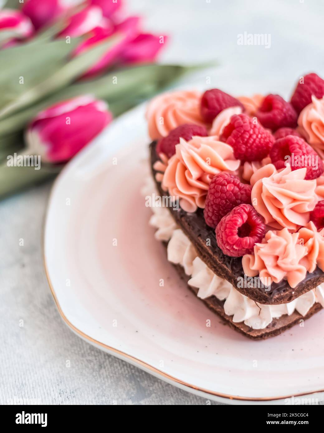 Cake in the shape of a heart from Traditional French dessert eclair and ...