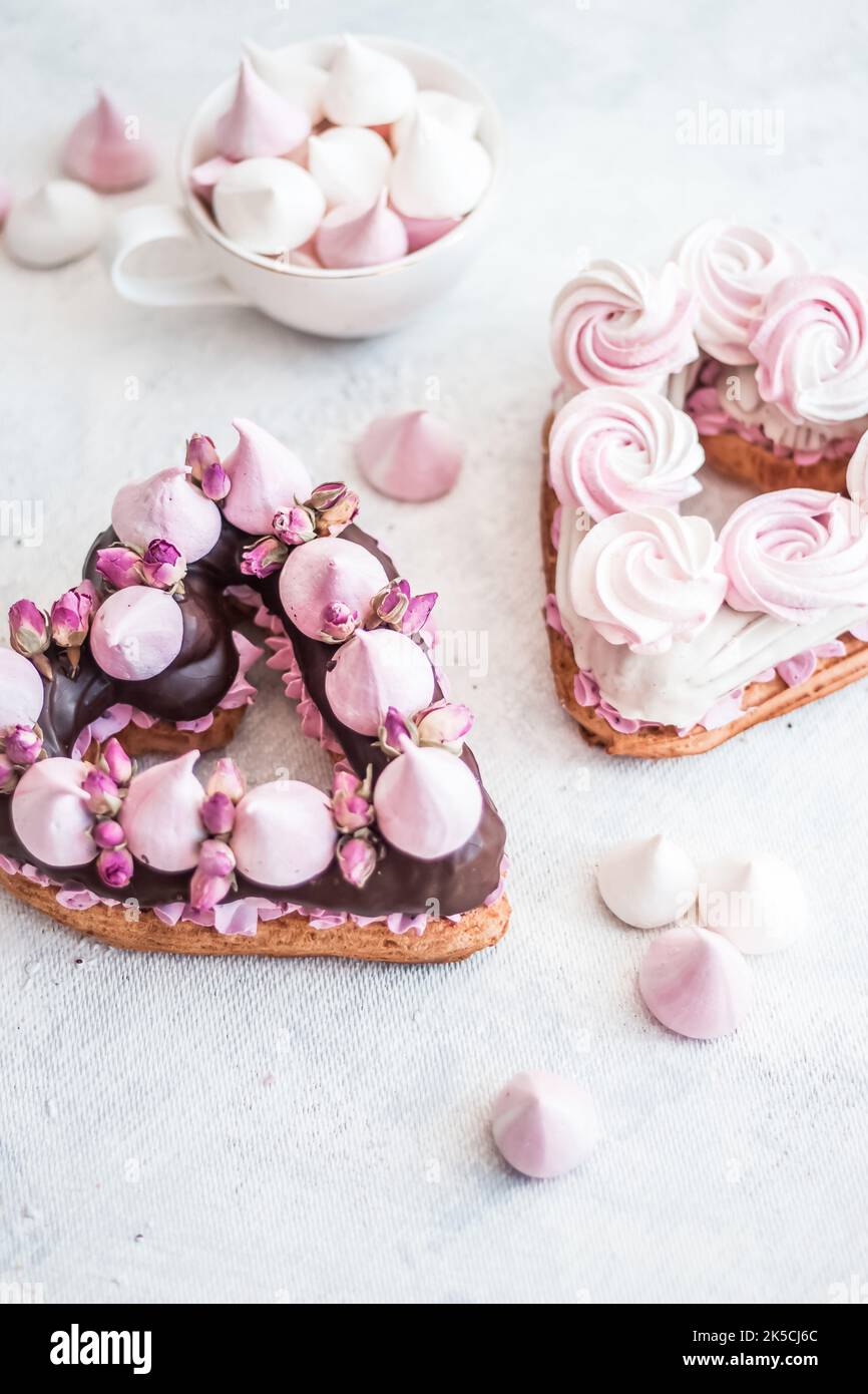Cake in the shape of a heart from Traditional French dessert eclair and ...