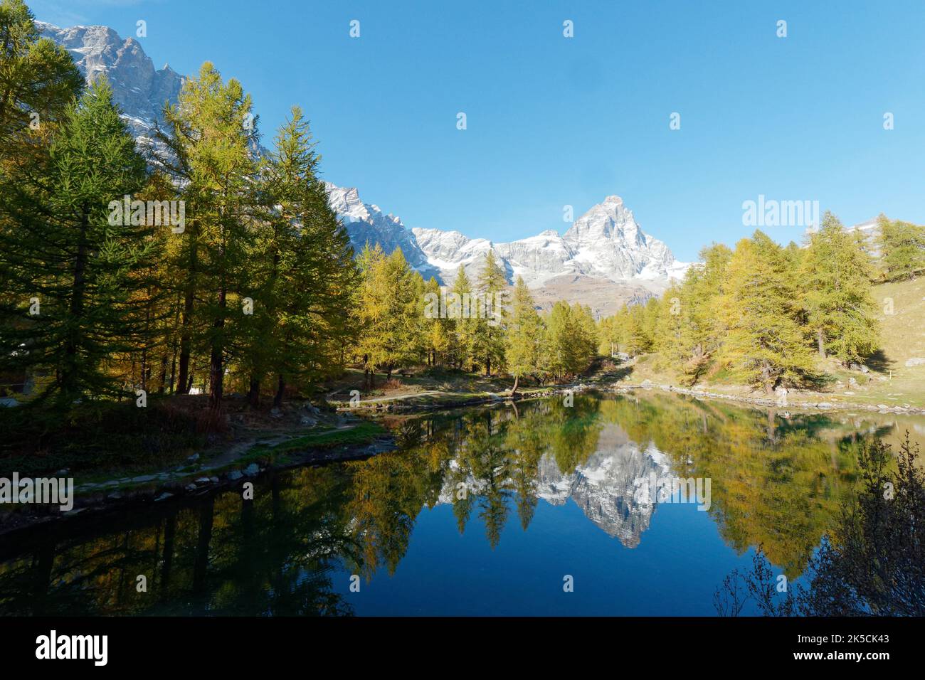 Cervino mountain (aka Matterhorn from the Swiss side) reflecting in ...