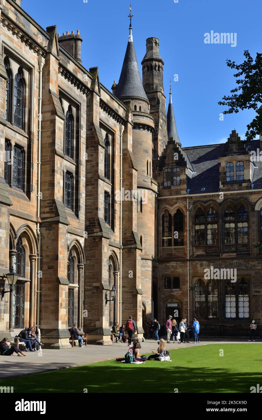 Students relaxing in the sun at Glasgow University, Gilbert Scott ...