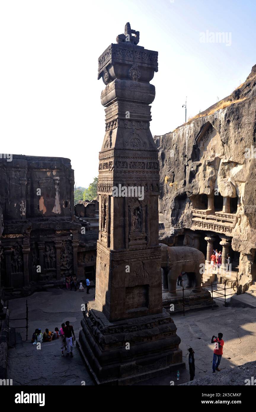 Victory pillar carved in a stone at Kailasa Cave Ellora UNESCO world ...