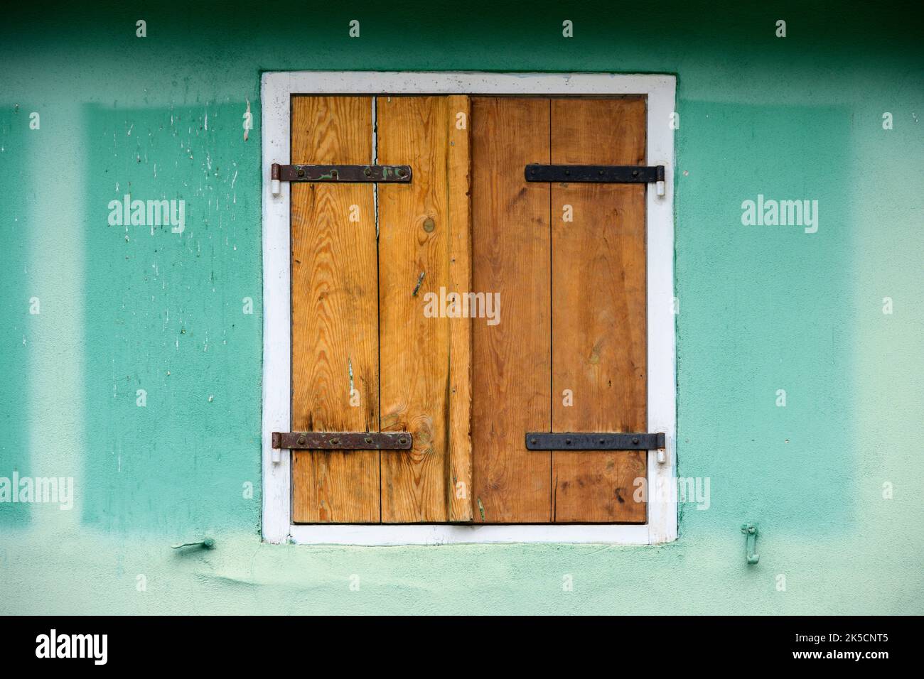 Windows with wooden shutters hi-res stock photography and images - Alamy