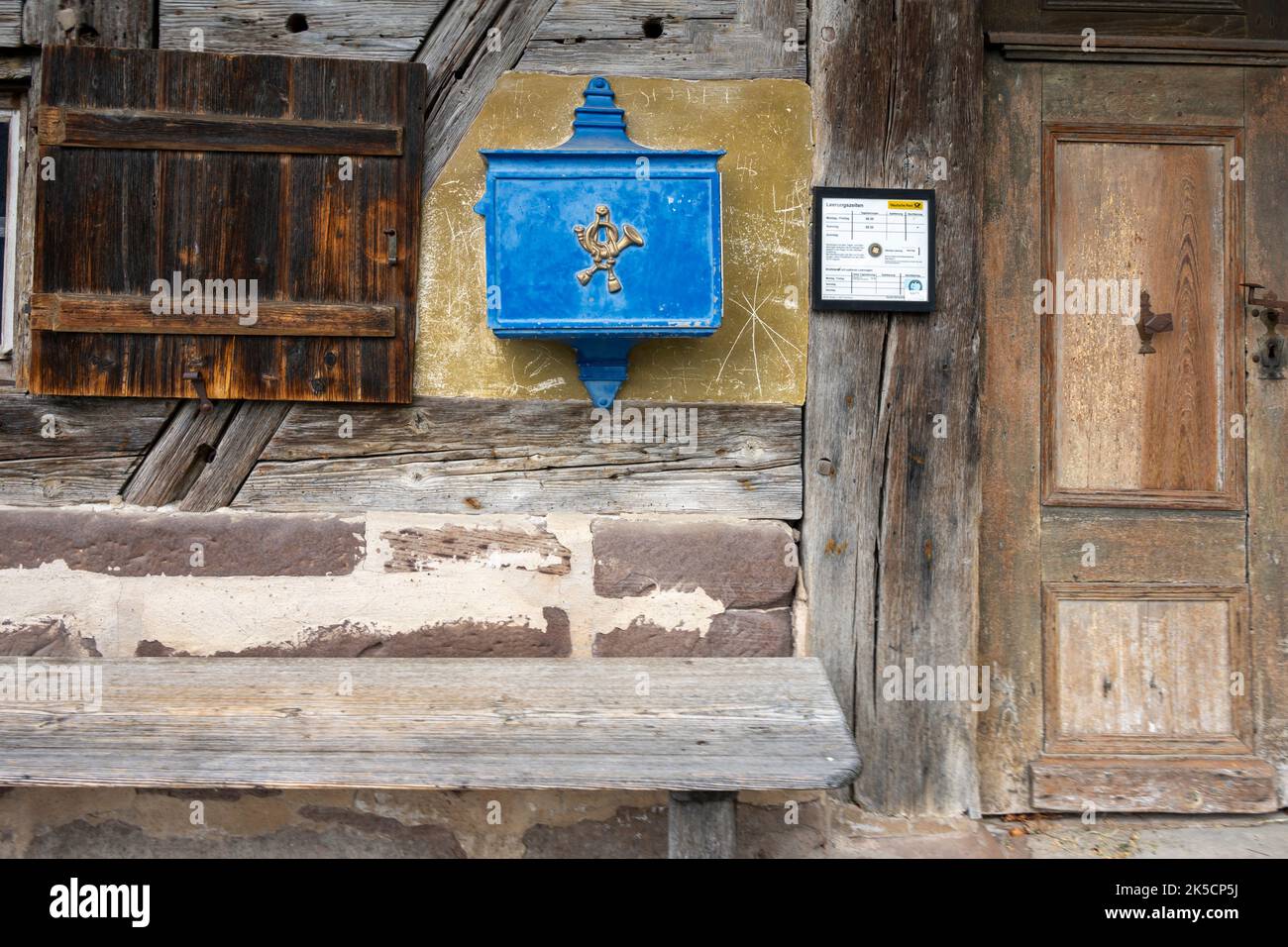 Germany, Bavaria, Bad Windsheim, old blue mailbox on a house wall Stock ...