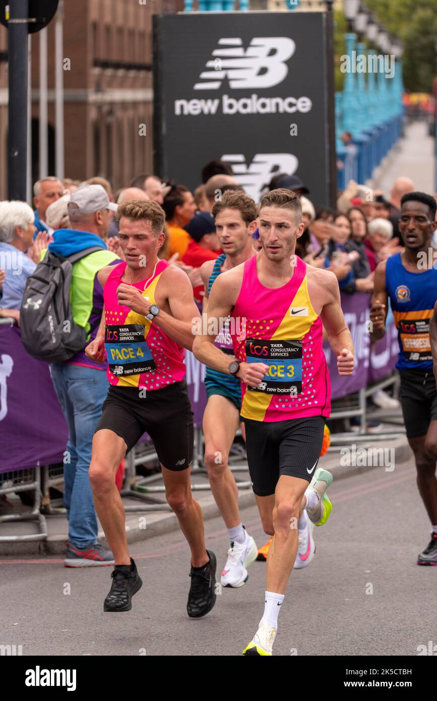 Pacemakers running in the TCS London Marathon 2022 Elite Men's race in ...