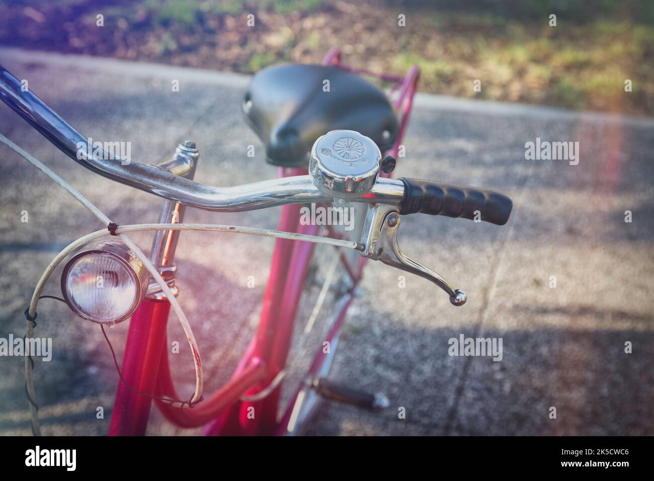 Italy, Veneto, Padova. City bicycle, handlebar details with bell, grip ...