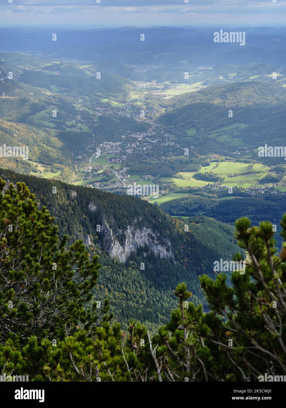 View of the surrounding villages and hills from the Rax mountain range ...