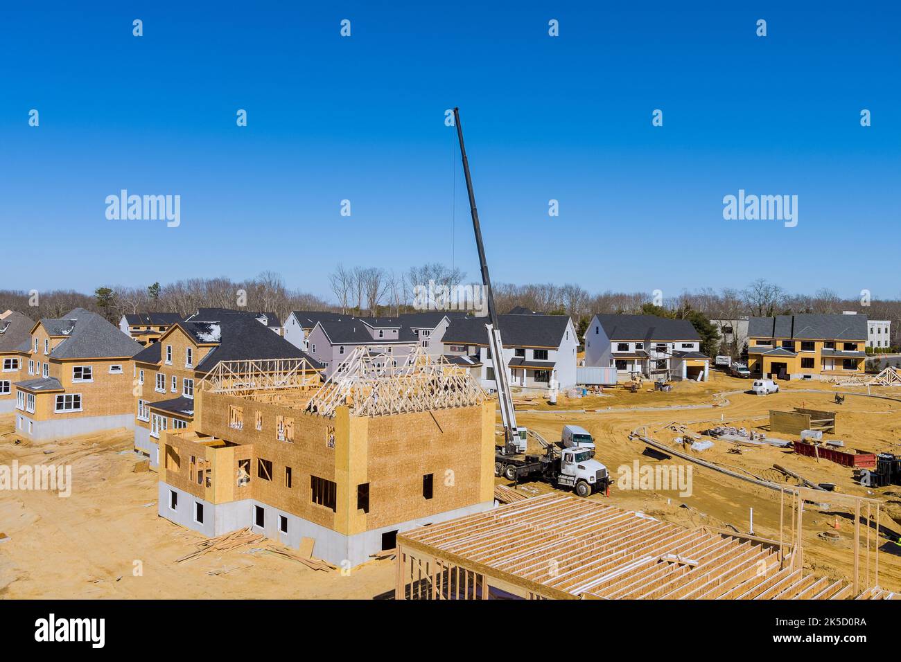 Aerial top view of unfinished subdivision incomplete neighborhoods ...