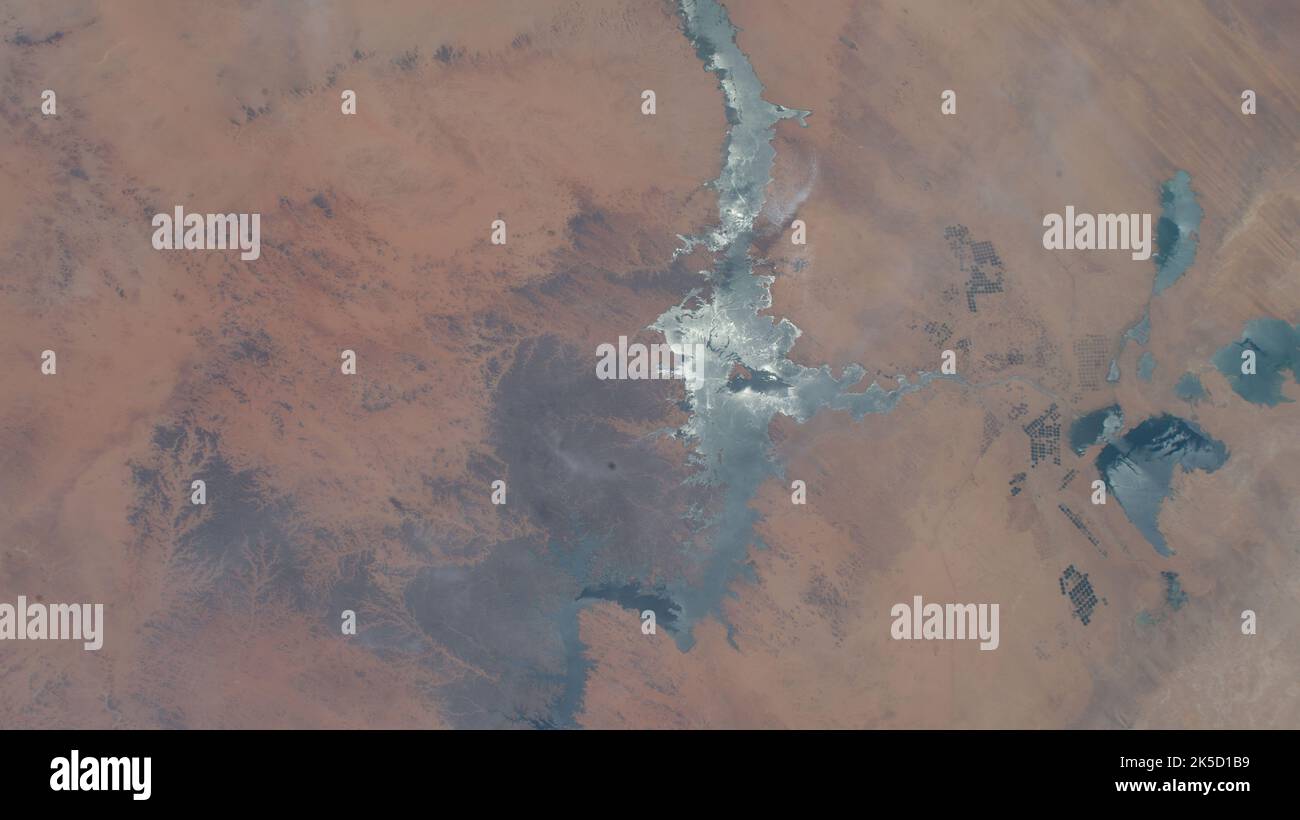 The sun's glint beams off Egypt's Lake Nasser, one of the largest man ...