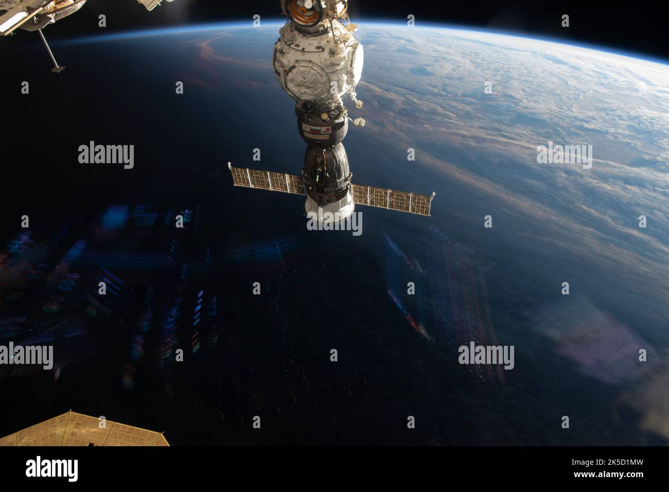 The Soyuz MS-21 crew ship is picture docked to the Prichal docking ...
