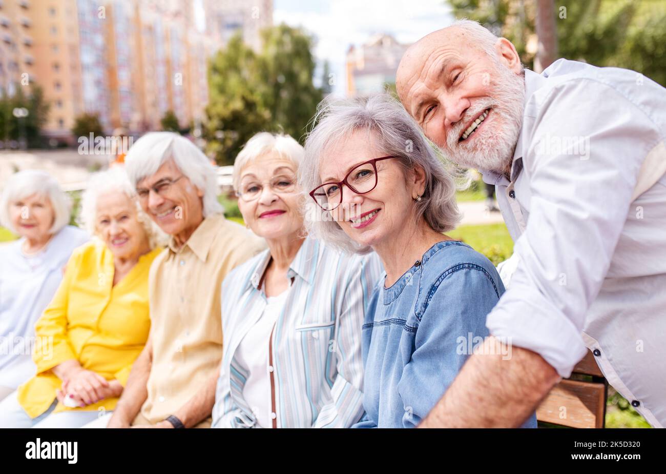 Group of happy elderly people bonding outdoors at the park - Old people ...