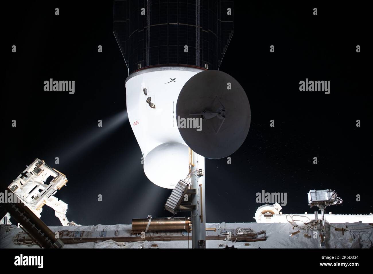 Plumes are pictured from the SpaceX Cargo Dragon resupply ship's Draco ...