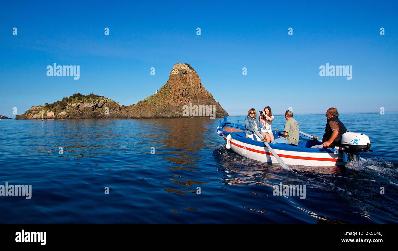 Italy, Sicily, Cyclops Coast, Cyclops Island, forested small island ...