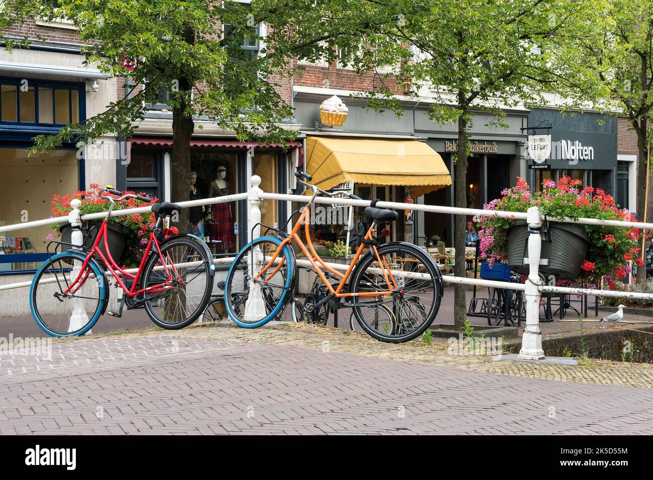 Delft (Netherlands), historic old town, Voorstraat, Poelbrug, bicycles ...