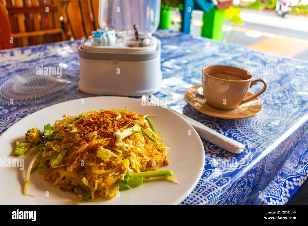 Thai asian rice and noodle dish on white plate in Sakhu Thalang on ...