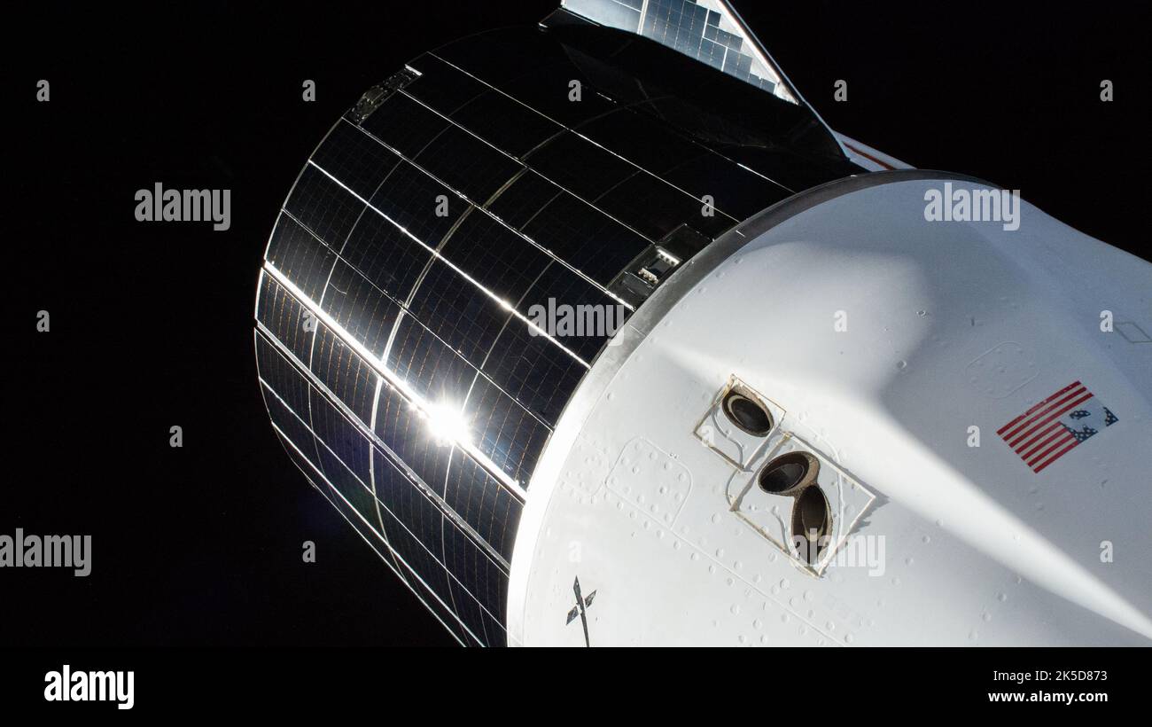 The SpaceX Cargo Dragon resupply ship, with its white pressurized ...
