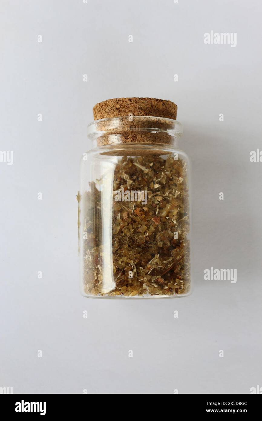 Natural aromatic incense musk in bottle isolated on a white background ...