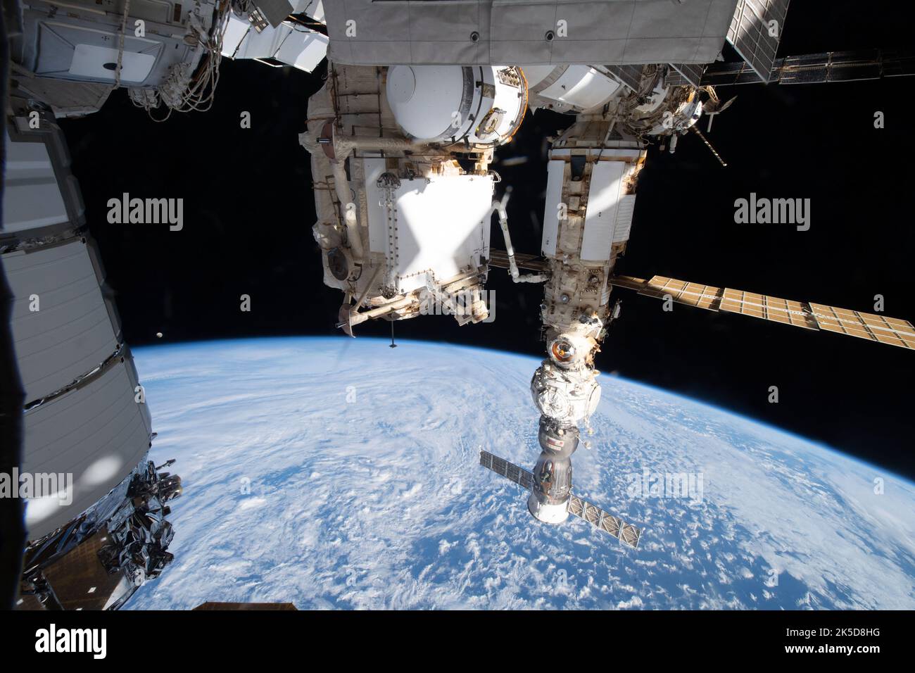 The Moon, with Earth's shadow draping across it during a lunar eclipse ...