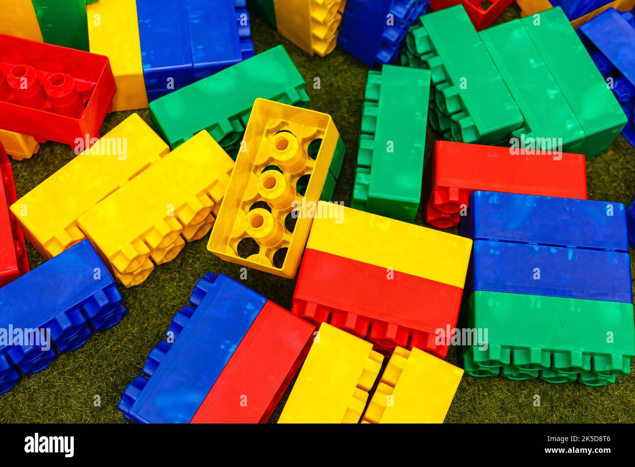 Plastic toy blocks for construction background Stock Photo - Alamy