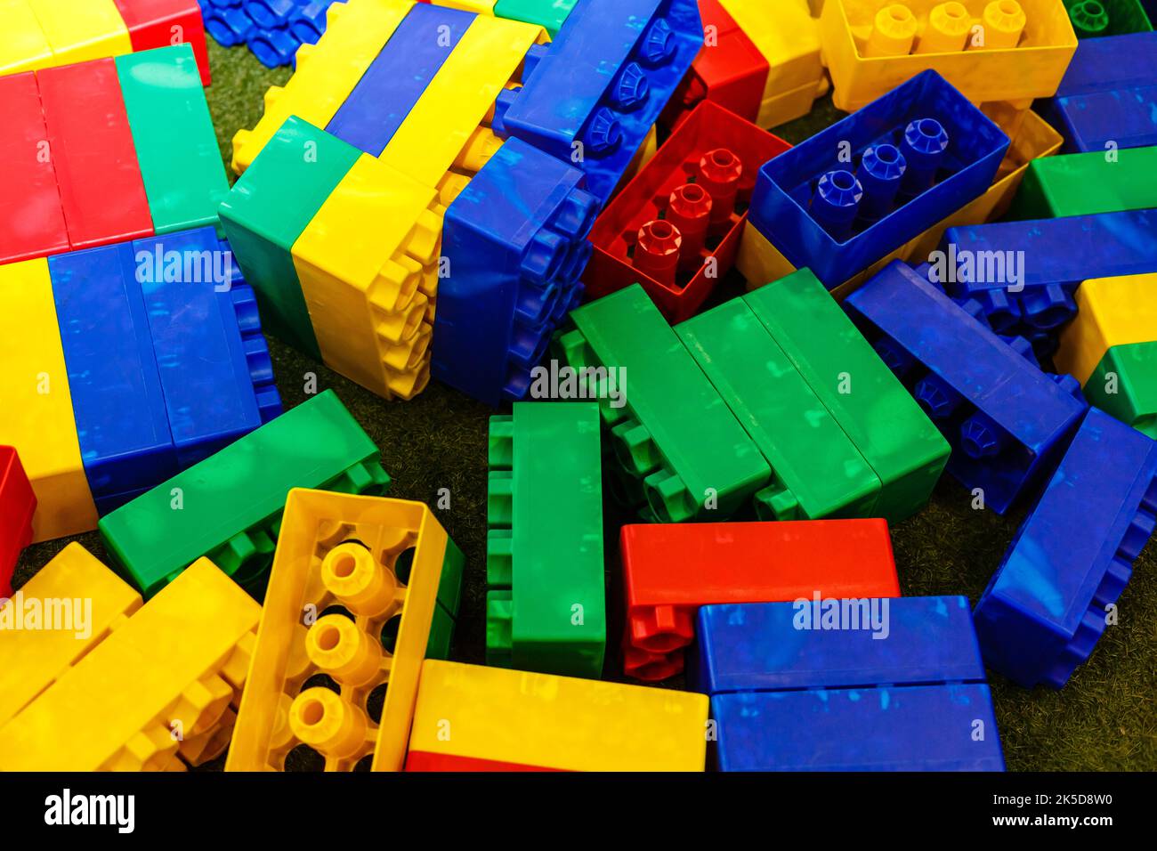 Plastic toy blocks for construction background Stock Photo - Alamy