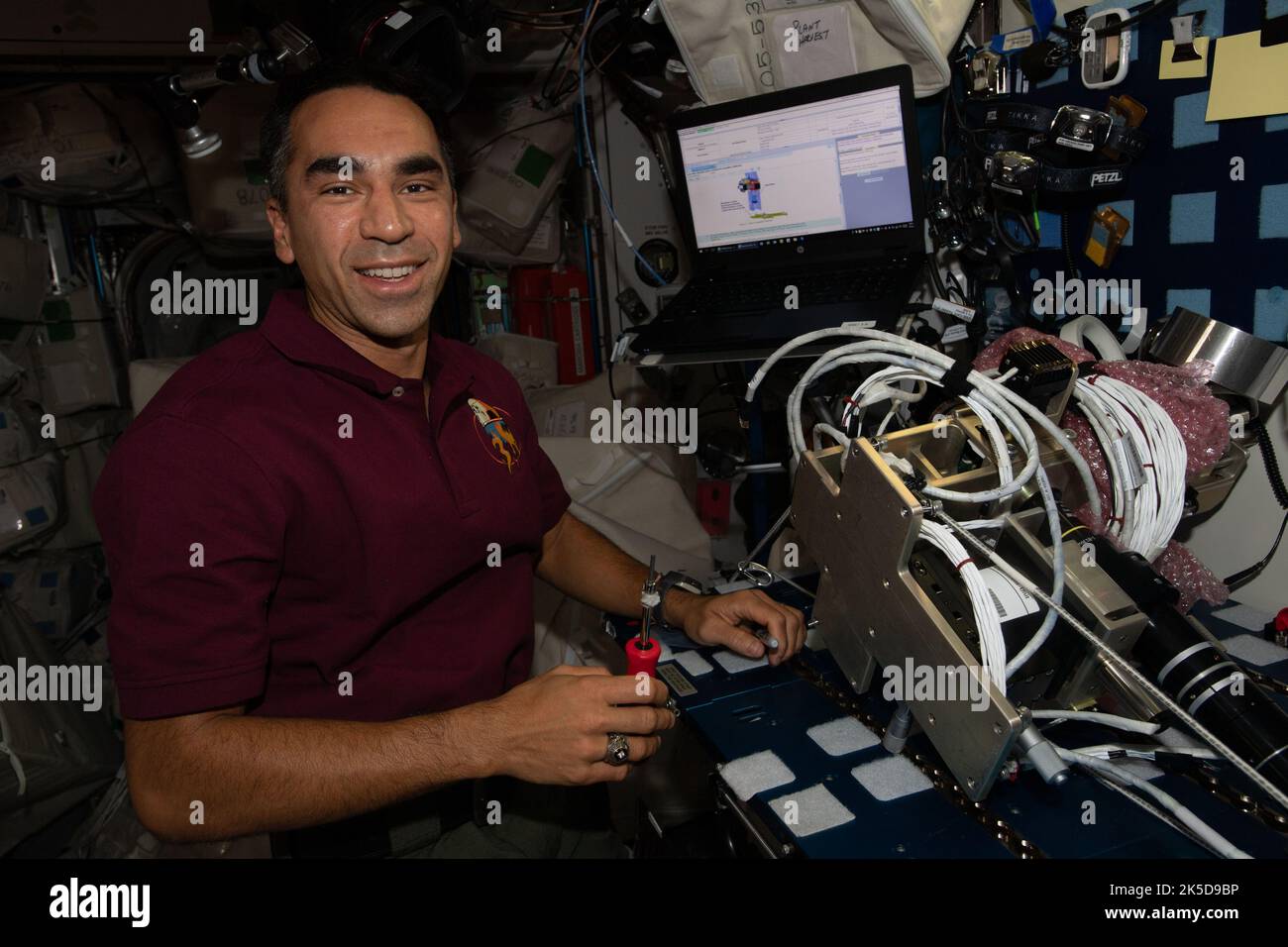 NASA astronaut and Expedition 66 Flight Engineer Raja Chari removes ... NASA astronaut and Expedition 66 Flight Engineer Raja Chari removes ...