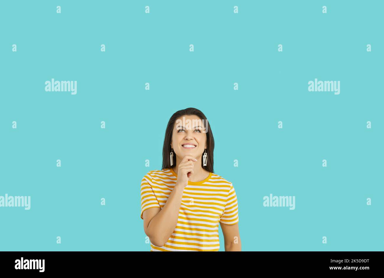 Happy Smiling Woman With Dreamy Facial Expression Isolated On Tiffany