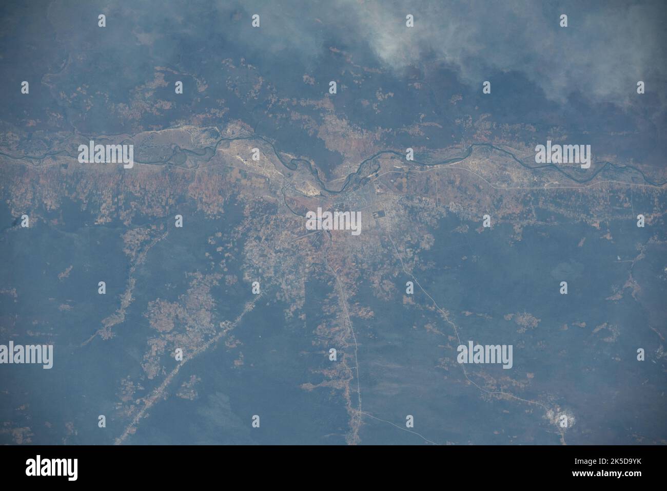 The Cubango River separates the African nations of Angola and Namibia ...