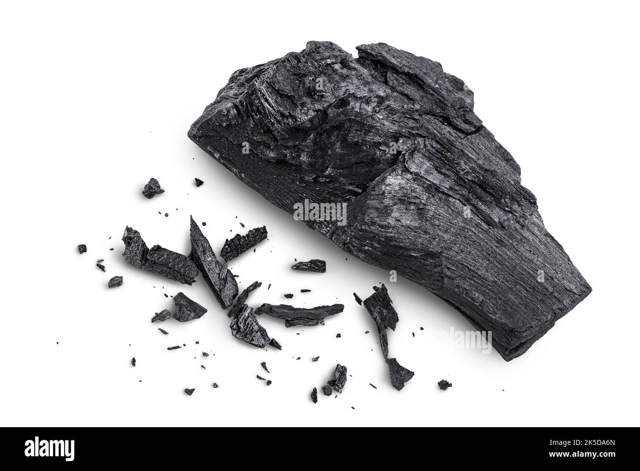 Natural wooden charcoal isolated on white background with full depth of ...