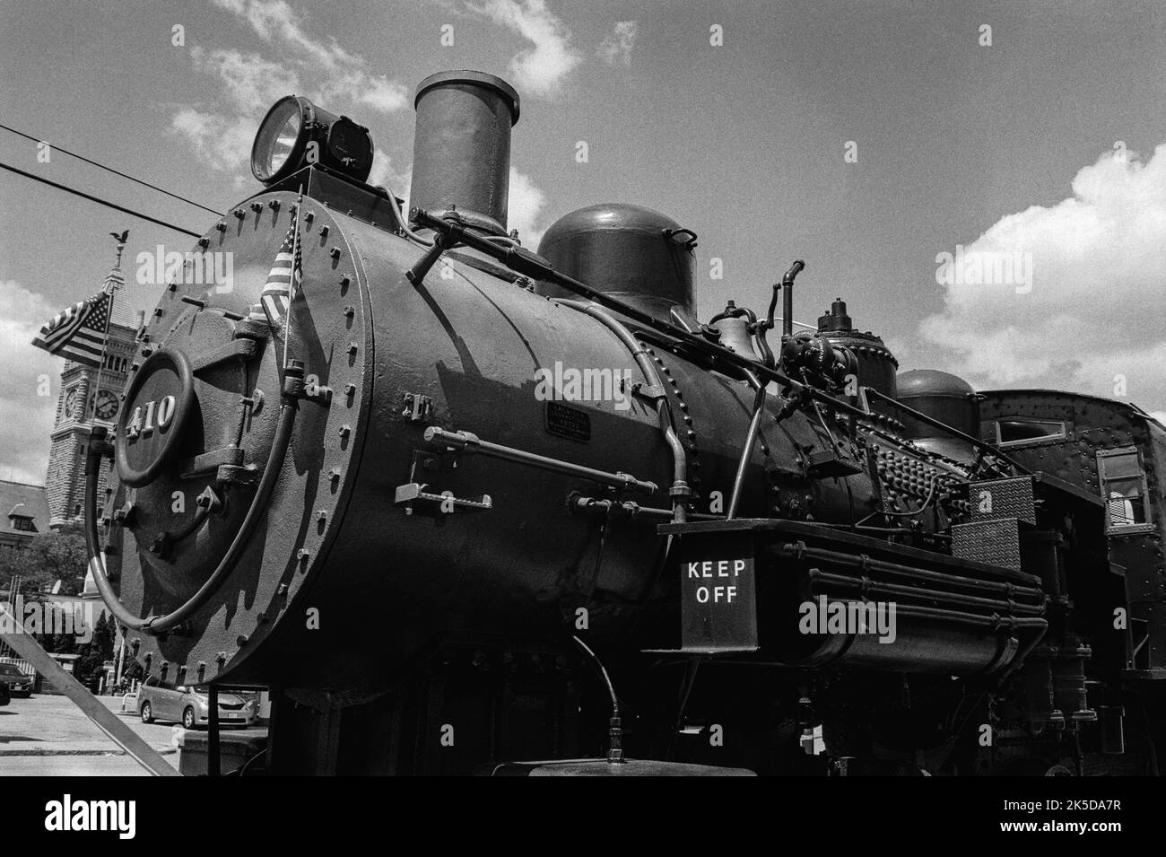 Vintage black steam train parked on tracks at the train museum in ...