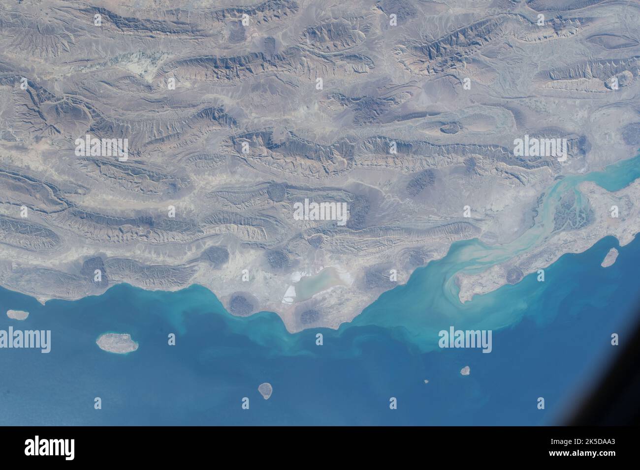 The semi-desert, southern coast of Iran on the Persian Gulf is pictured ...