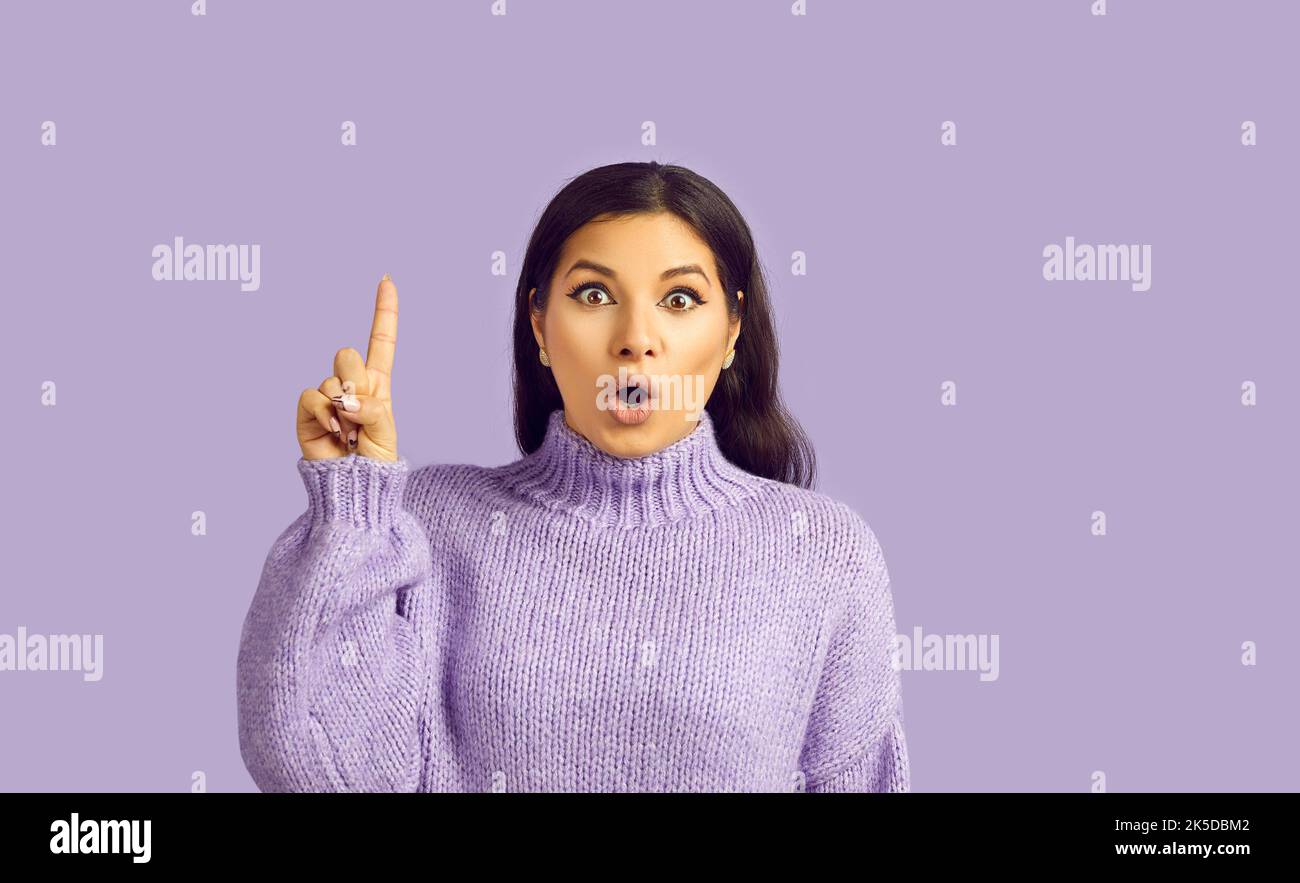 Portrait of happy emotional woman who came up with great idea isolated ...