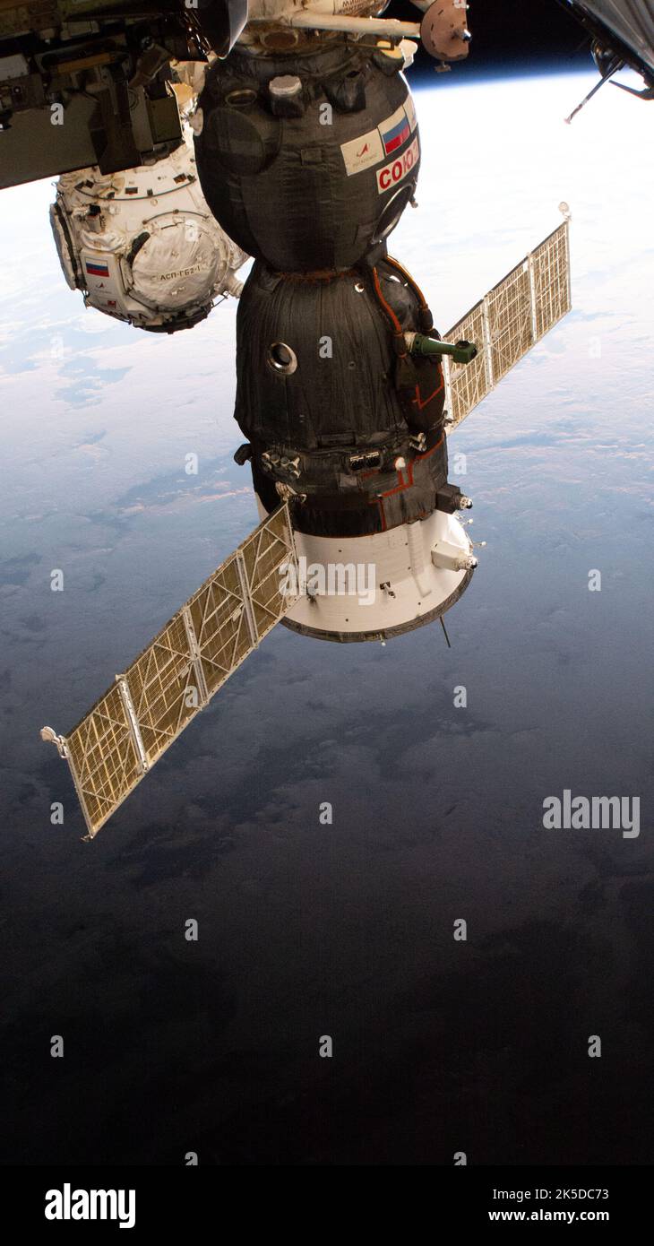 The Soyuz MS-19 crew ship and the Prichal docking module (background ...