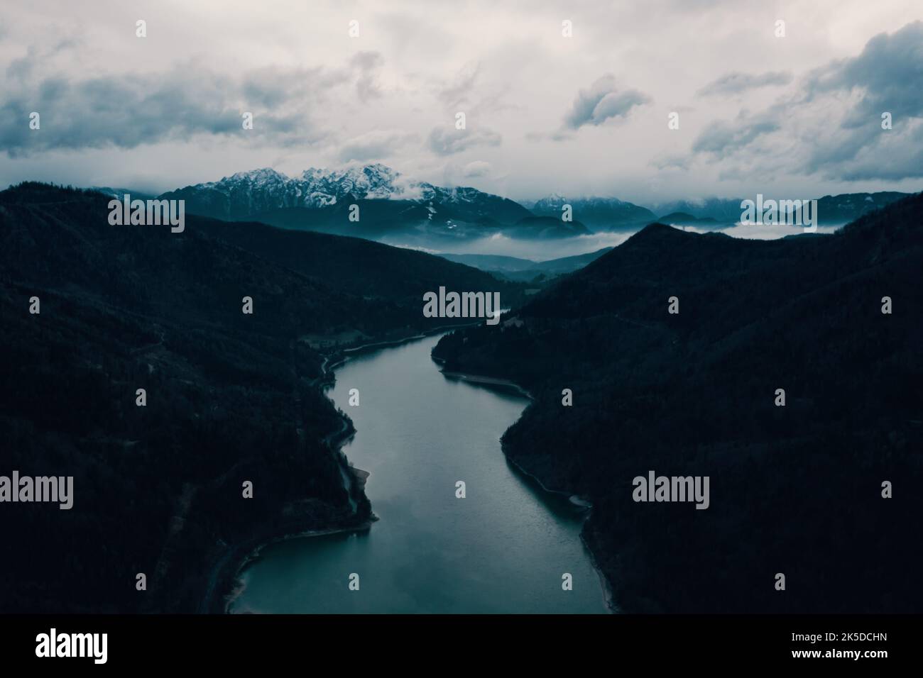 An aerial shot of the Wiestalstausee reservoir in Salzburg, Austria ...