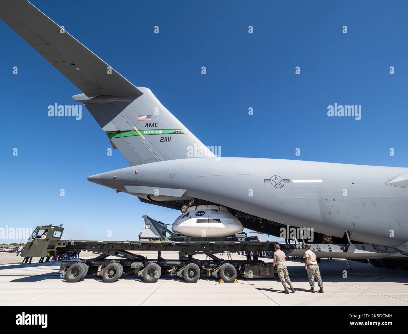 The Orion team prepares the parachute test vehicle for the final drop ...
