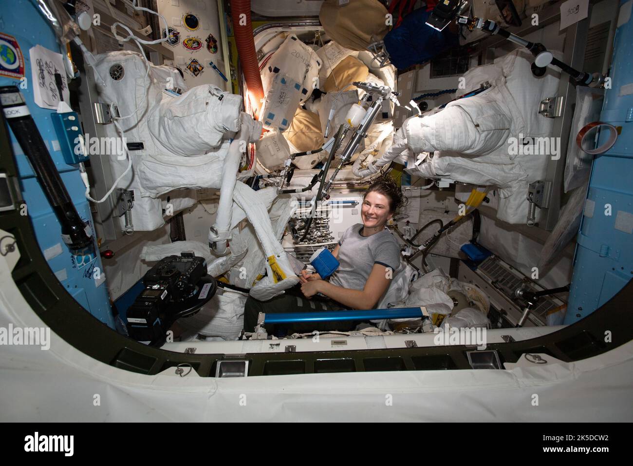 NASA astronaut and Expedition 66 Flight Engineer Kayla Barron cleans ...