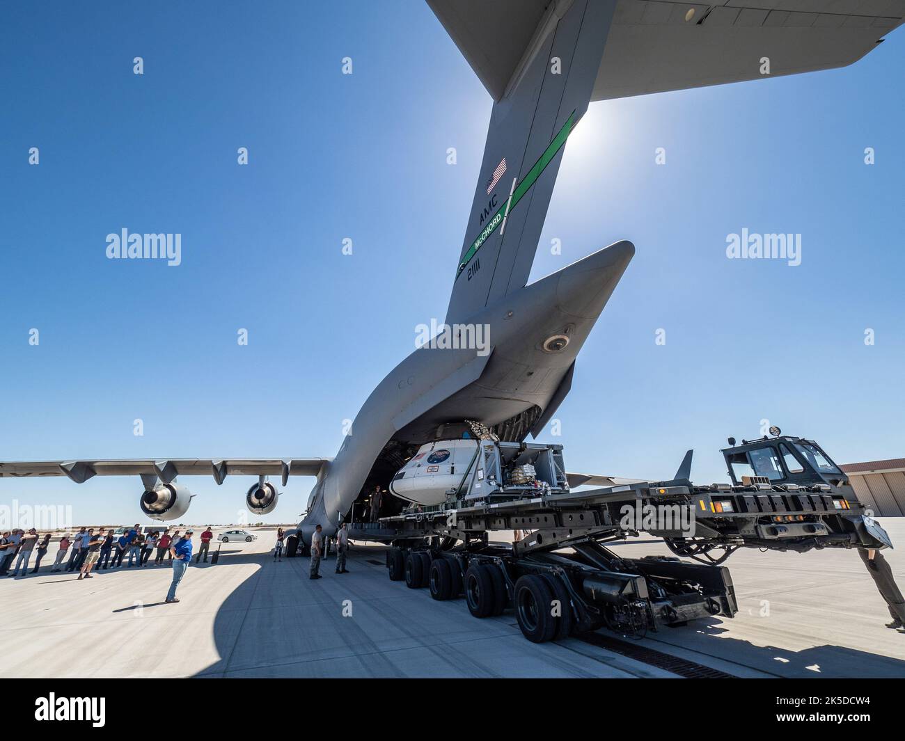 The Orion team prepares the parachute test vehicle for the final drop ...